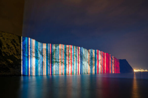 Climate warming stripes light up the White Cliffs of Dover